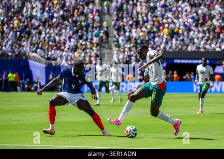 Nicolas Jackson of Senegal comeptes for the ball with Dayot Upamecano ...