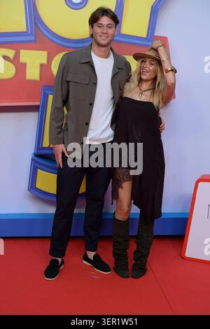 Caroline Tronelli (r) and Emanuele Menenschincheri (l) attend the red ...