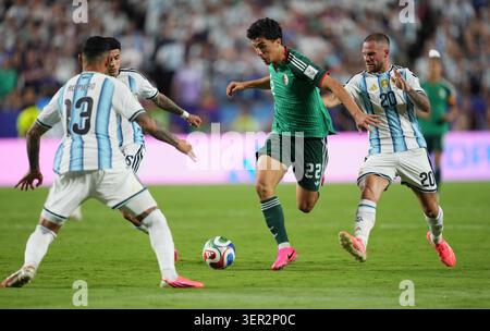 Ibrahim Maza (Algeria) controls the ball during Argentina and Algeria ...