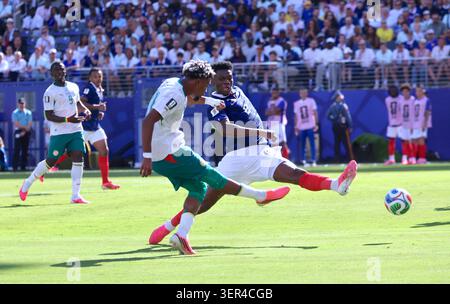 French and Senegalese soccer players in action during World Cup 2026 ...