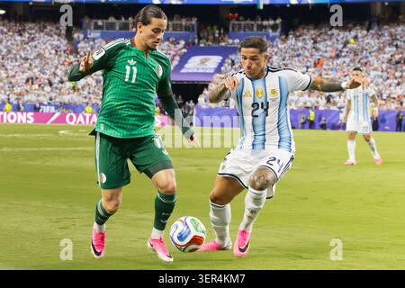 JUNE 16, 2026: Algeria midfielder Ibrahim Maza (22) fights for the ball ...
