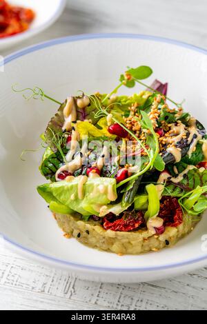 Healthy Mediterranean salad with vegetables and grains Stock Photo - Alamy