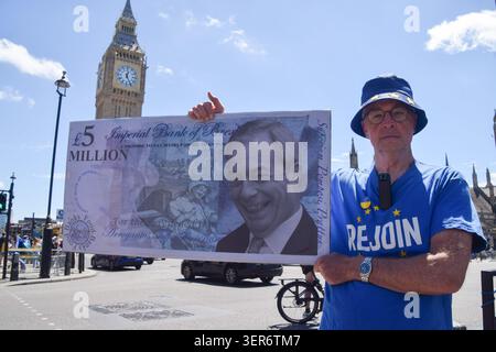 A large mock 5 million pound note with a portrait of Reform UK leader ...
