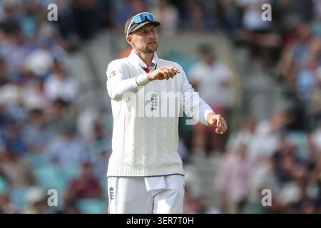 England captain Joe Root gives instruction to his teammate during the ...