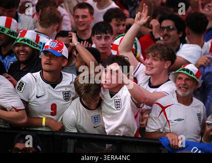 Fans watch a screening of the FIFA World Cup match between England and ...