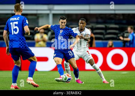 DALLAS - (lr) Petar Musa of Croatia and Ezri Konsa of England during ...