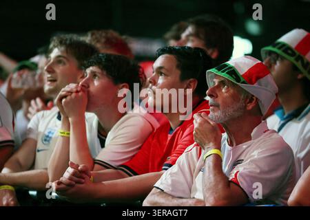 Fans watch a screening of the FIFA World Cup match between England and ...