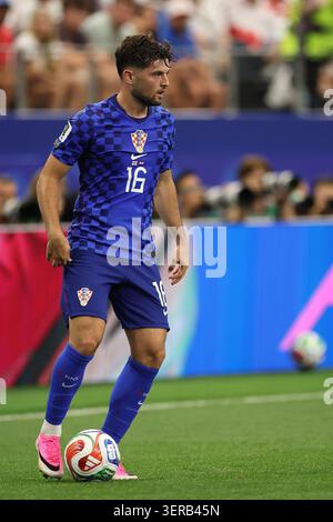 DALLAS - (l) Martin Baturina of Croatia during the 2026 World Cup at AT ...