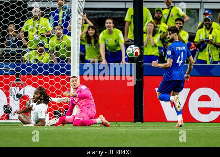 DALLAS - (lr) Djed Spence of England and Nikola Vlasic of Croatia ...