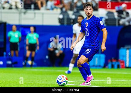 Croatia midfielder Martin Baturina (16) celebrates a goal during the ...