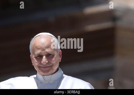 Pope Leo XIV leaves at the end of his weekly general audience at St ...