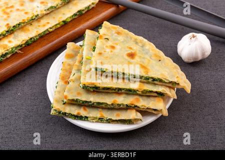Traditional Chinese Chive and Egg Stuffed Flatbread on Plate, Savory ...