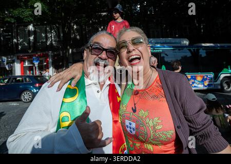 Supporters gather at the official FIFA World Cup Fan Zone in Praça D ...