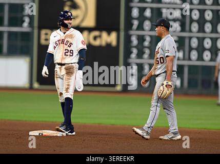 Houston Astros second baseman Raynel Delgado (29) and shortstop Jeremy ...
