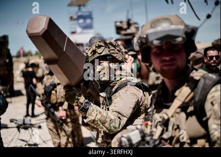 A soldier equipped with a drone-jamming rifle after a demonstration, at ...