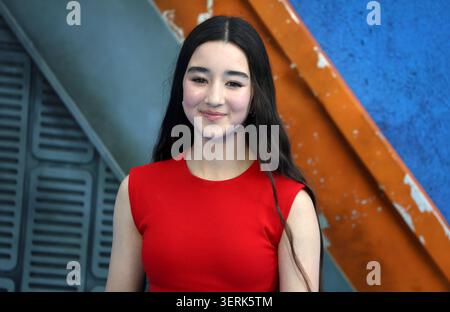 Eve Ridley attends the UK sneak peak fan event for the movie Supergirl ...