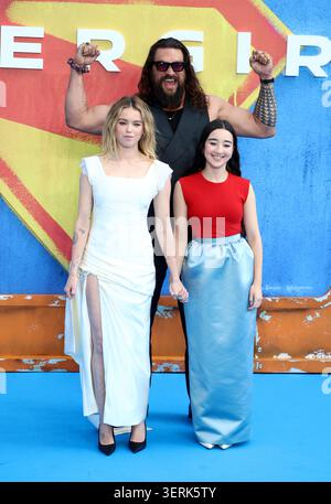 Milly Alcock, Jason Momoa and Eve Ridley walk the red carpet.Credit ...