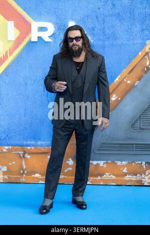 Jason Momoa attends the UK sneak peak fan event for the movie Supergirl ...