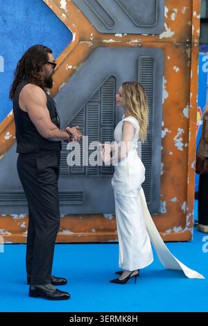 Jason Momoa and Milly Alcock attend the 'Supergirl' UK Sneak Peek Fan ...