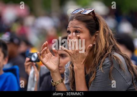 A woman cries during the former President Barack Obama's speech at ...