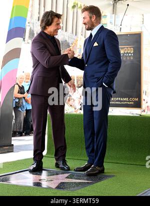 Actor Tom Cruise poses with honoree David Beckham on his Star On The ...