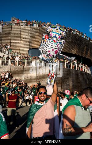 Fans watch the Mexico vs. South Korea World Cup game at a watch party ...