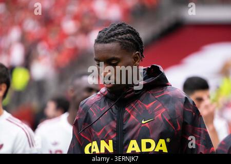 VANCOUVER, CANADA - JUNE 18: Moise Bombito of Canada kicks the ball ...