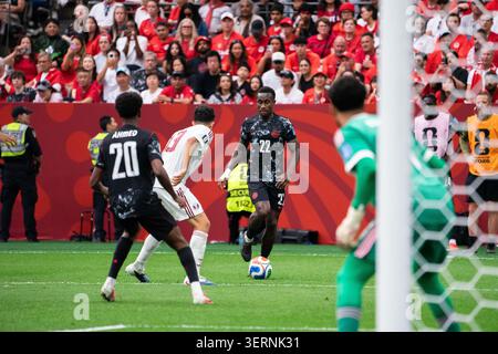 VANCOUVER, CANADA - JUNE 18: Richie Laryea of Canada controls the ball ...