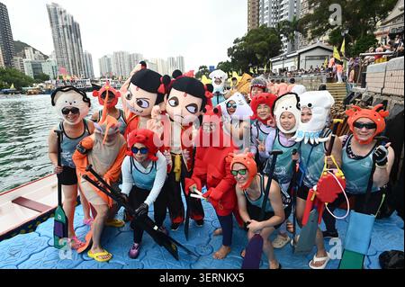 Cosplayers cosplaying Ne Zha and Seafood on a dragon boat race in ...