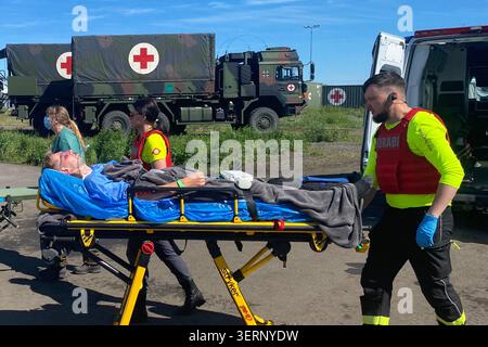 PRODUCTION - 16 June 2026, Estonia, Tallinn: Actors portraying wounded ...