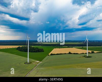 Petersdorf, Germany. 19th June, 2026. Dark storm clouds are rolling ...
