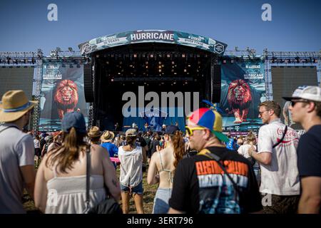 19 June 2026, Lower Saxony, Scheeßel: Festivalgoer John is standing on ...