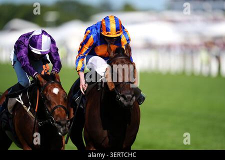 Causeway ridden by Ryan Moore (right) passes Ancient Egypt ridden by ...
