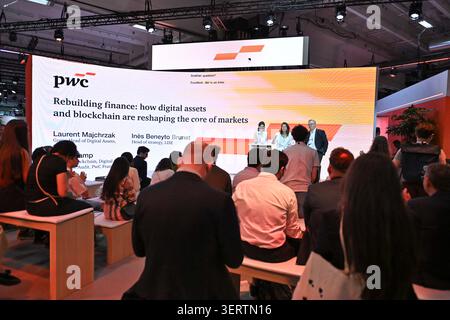 This photograph shows the VivaTech event as visitors walk around in ...