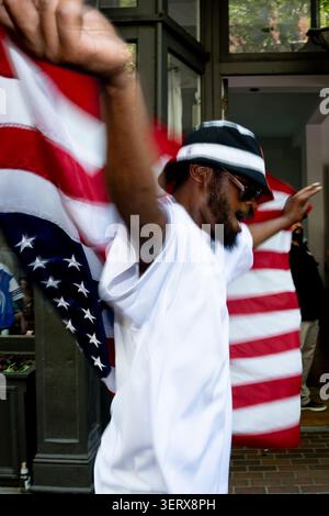 Seattle, USA. 19th Jun 2026. U.S. soccer fans cheer in Pioneer Square ...