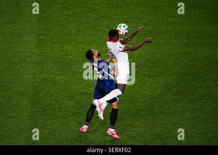 Danley Jean Jacques of Haiti comeptes for the ball with Matheus Cunha ...