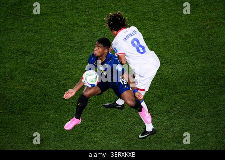 Endrick of Brazil competes for the ball with Martin Experience of Haiti ...