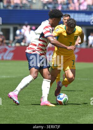 Mathew Leckie (L) of Australia men football team and Tim Ream (R) of ...