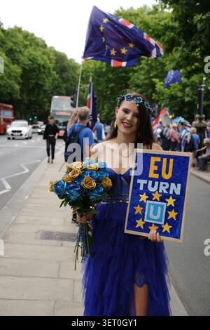 People during a National Rejoin March in London, marking 10 years since ...