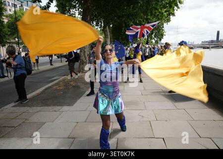 People during a National Rejoin March in London, marking 10 years since ...