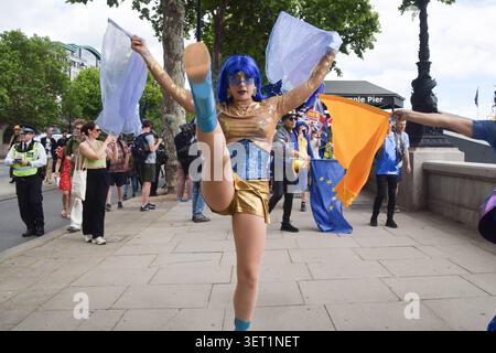 A dancer performs during the National Rejoin March, calling on the UK ...