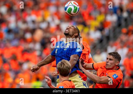 Sweden defender Isak Hien (4) and Netherlands midfielder Guus Til (16 ...
