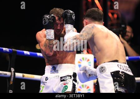 Bradley Goldsmith (left) in action against Brad Pauls in the IBF ...