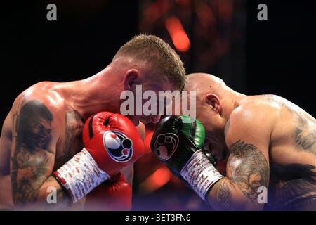Michael Magnesi (left) in action against Ryan Garner during the vacant ...