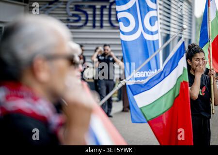 ROTTERDAM - Demonstrators before the unveiling of a national monument ...
