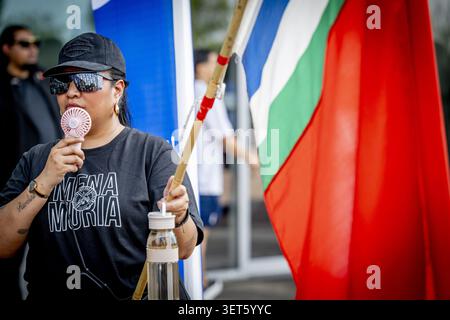 ROTTERDAM - Demonstrators before the unveiling of a national monument ...