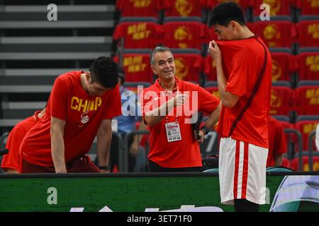 Hangzhou, China. 21 June, 2026. Guo Shiqiang head coach of China during ...