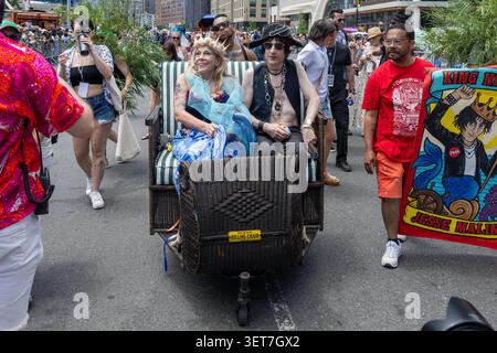Parade king Jesse Malin and queen Rickie Lee Jones participate in the ...