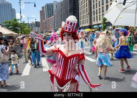 A reveler dressed with a Popcorn costume participates in the annual ...