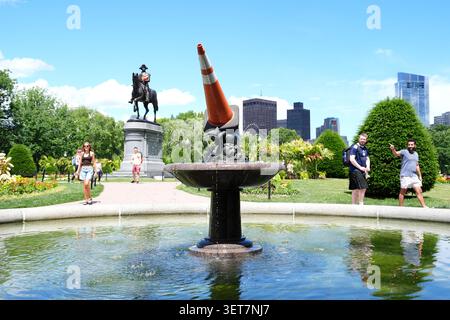A general view of a orange cone on a water feature in a park in Boston ...